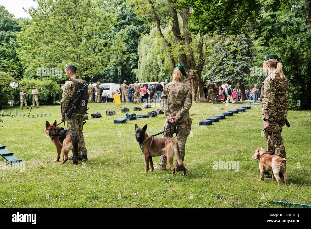Ukrainian border guards with service dogs. Training of working dog ...