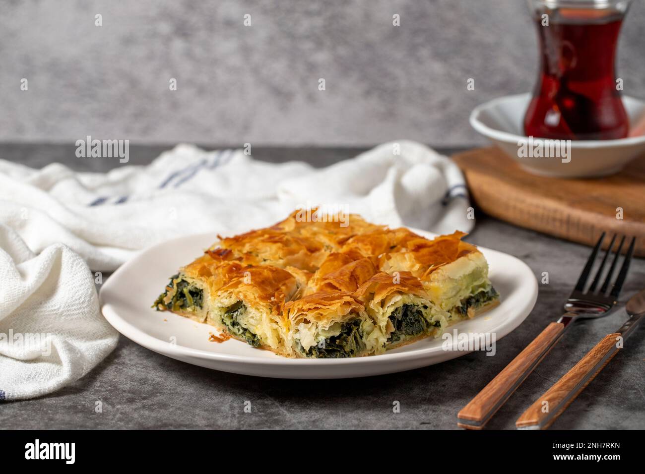 Spinach pastry. Traditional Turkish cuisine delicacies. Spinach pie ...