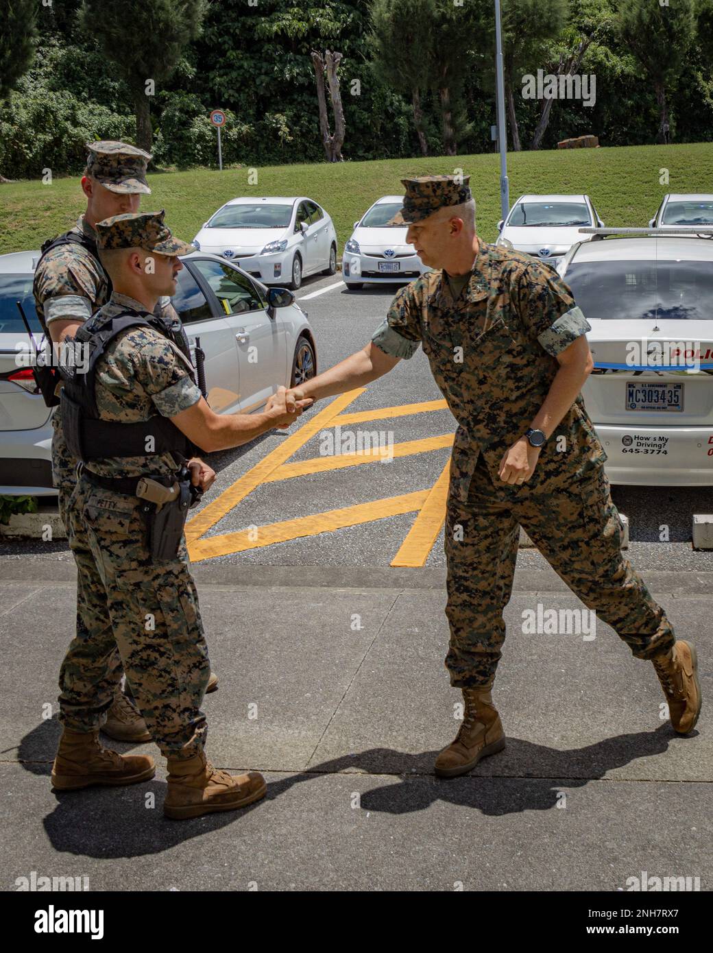 U.S. Marine Corps Cpl. Ryan Petty, left, a patrolman with Provost ...
