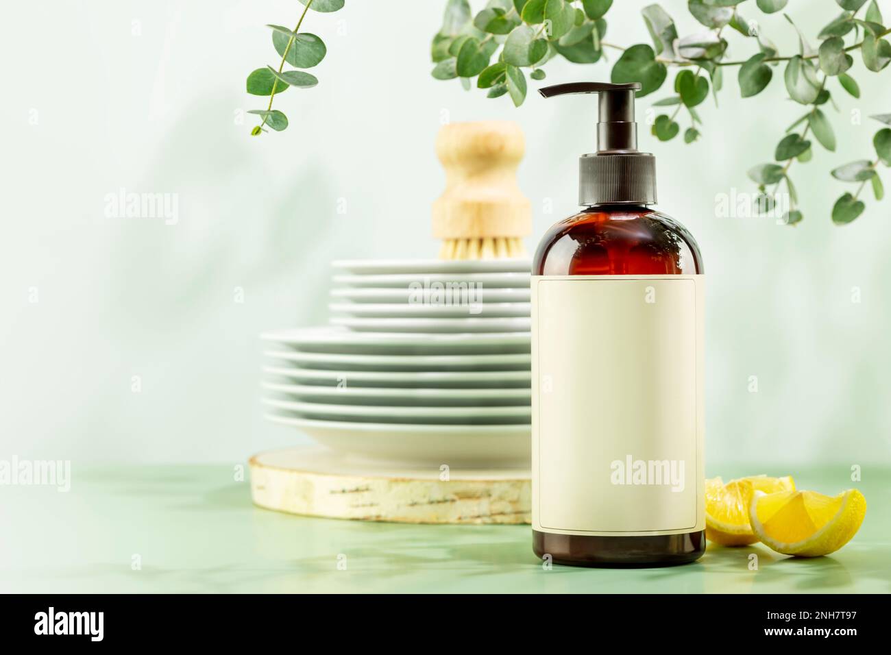 Mockup of natural dish detergent. Eco friendly cleaning dishes. Bottle ...