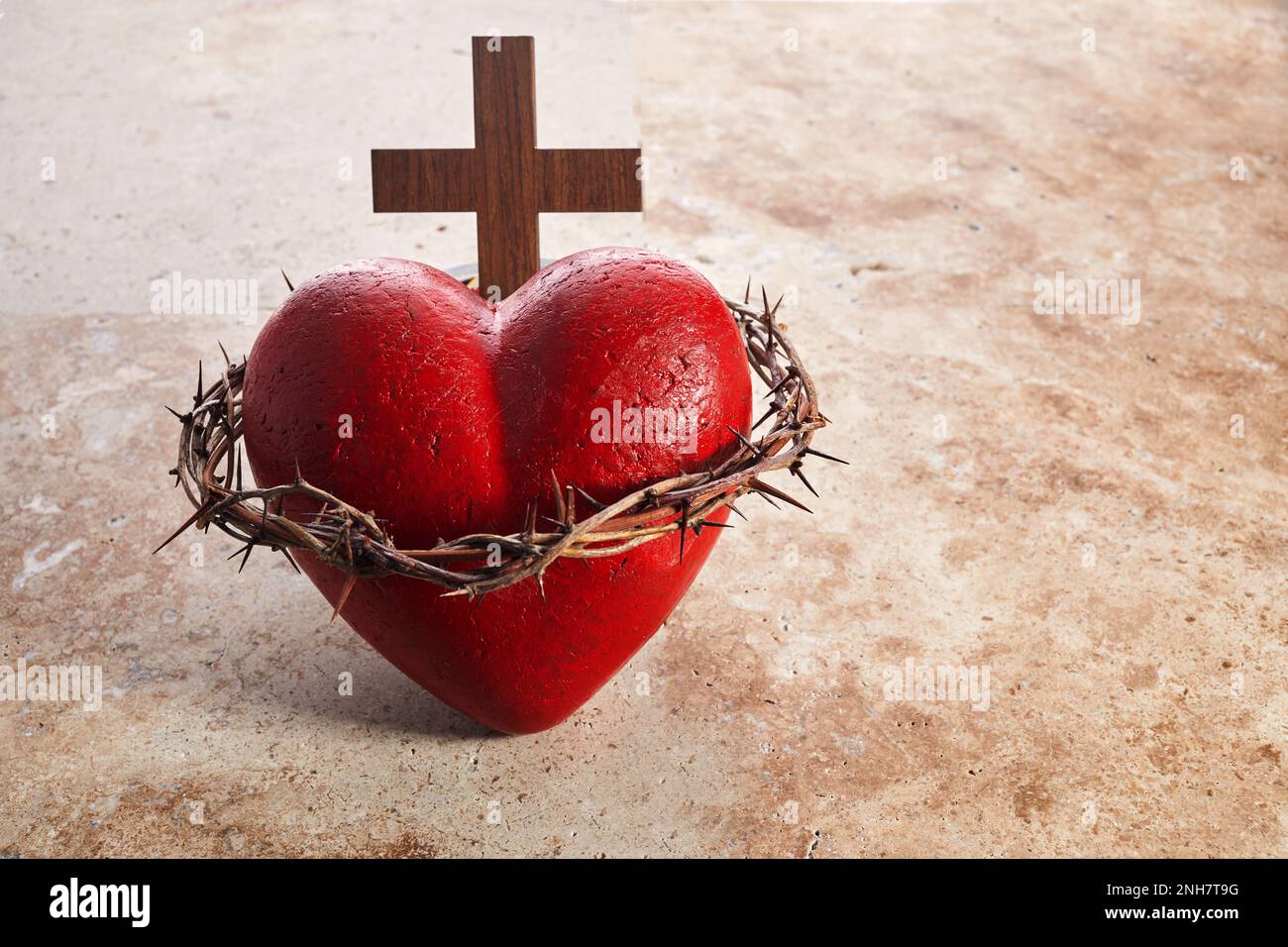Sacred Heart of Jesus, surrounded by a crown of thorns and with wooden ...
