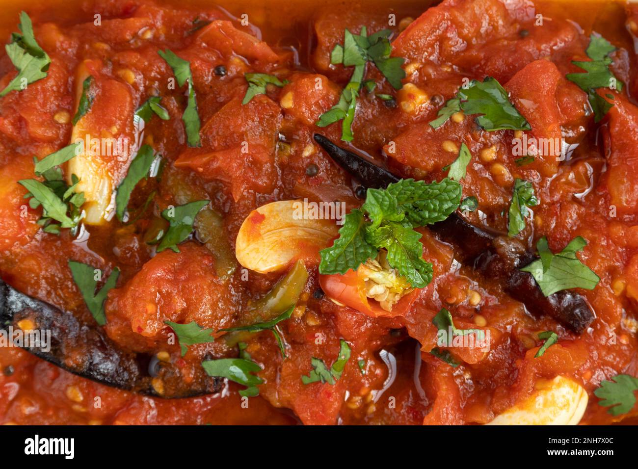 Tangy And Spicy Tomato Chutney Also Called Lehsoon Pyaaj Tamatar Ki ...