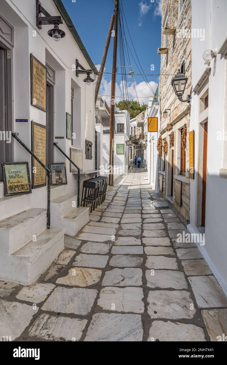 A characteristic alleyway in the mountain village of Apeiranthos, Naxos ...