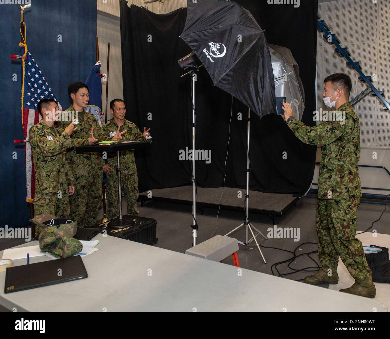 Japan Ground Self-Defense (JGSDF) Sgt. Yamazaki Daiki takes photos of ...