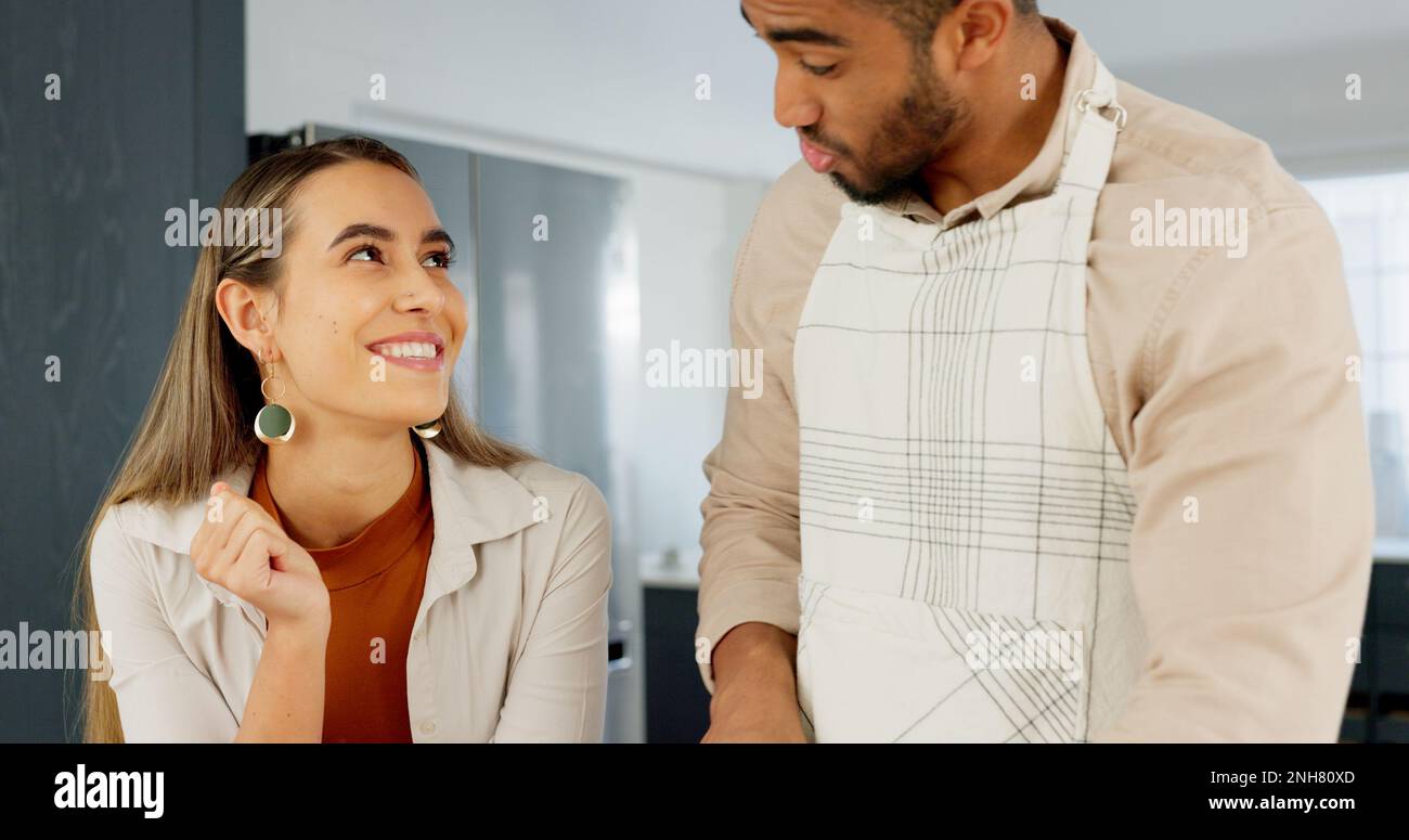 Young couple in kitchen, people cooking in Mexico apartment and comic ...