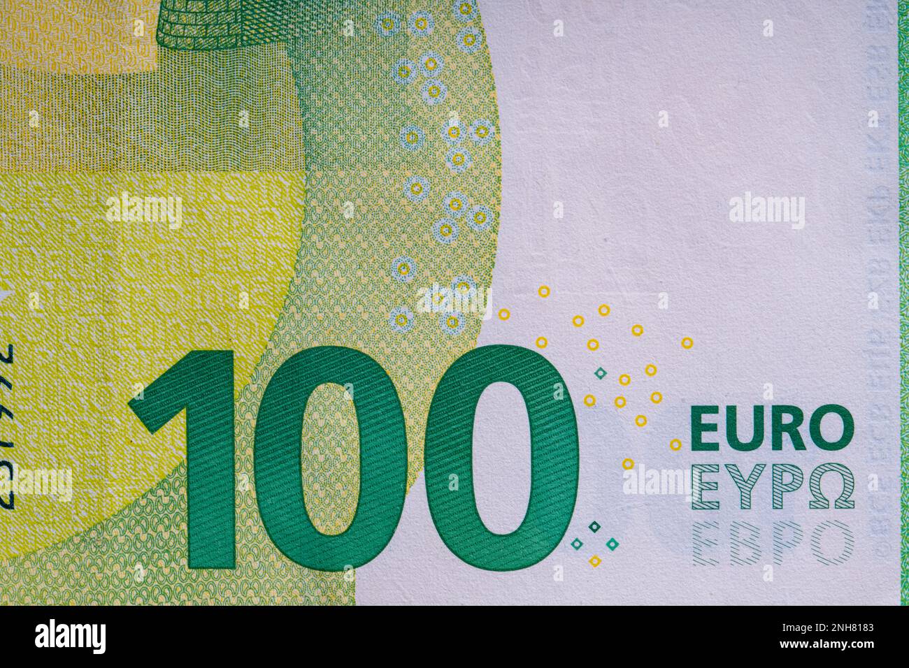 100 euro banknote close up, yellow background for business finance ...