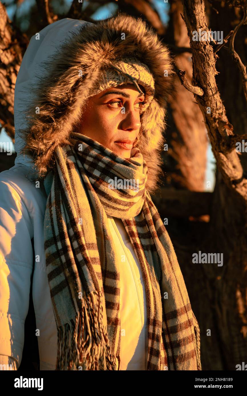 Beautiful female hiker dressed for the cold while hiking at Zion ...