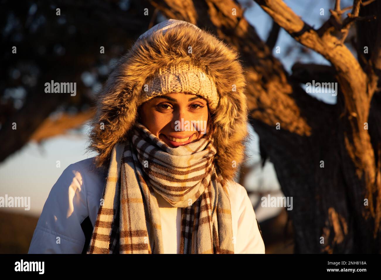Beautiful female hiker dressed for the cold while hiking at Zion ...