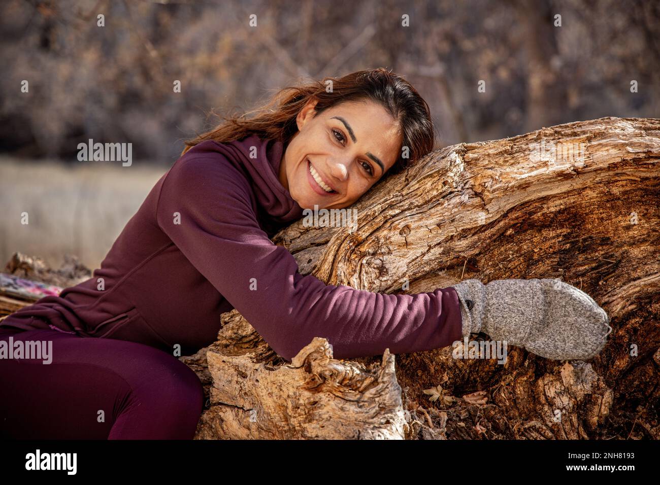 Beautiful female hiker dressed for the cold while hiking at Zion ...