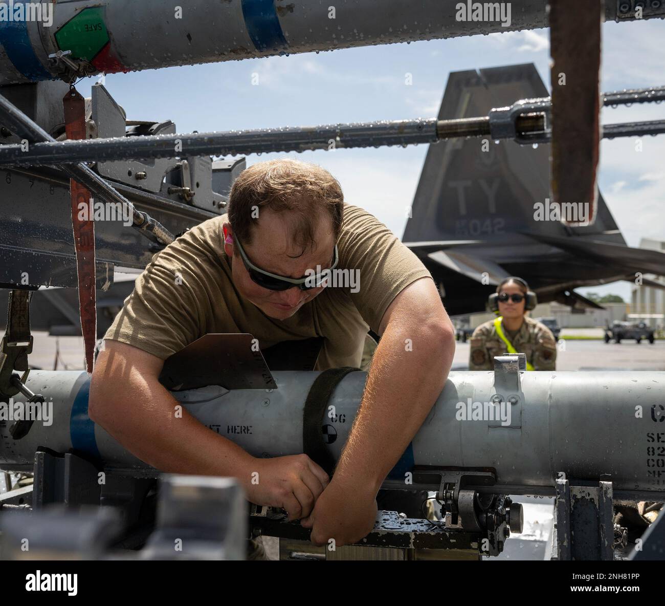 Staff Sgt. Race Ryan, 43rd Fighter Generation Squadron, secures an AIM ...