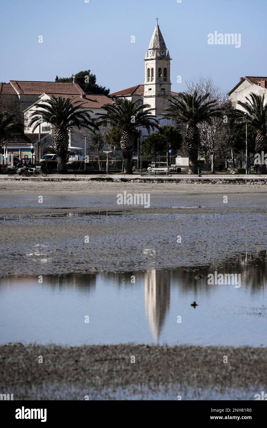 Boats stranded at low tide, in Stobrec, Croatia, on Feb. 21, 2023 ...