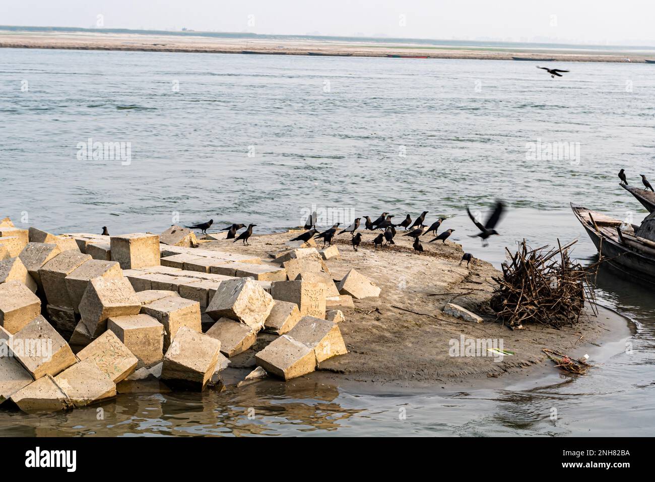 Gray Cement Cinder Block Isolated On river side. Granite bolder in ...