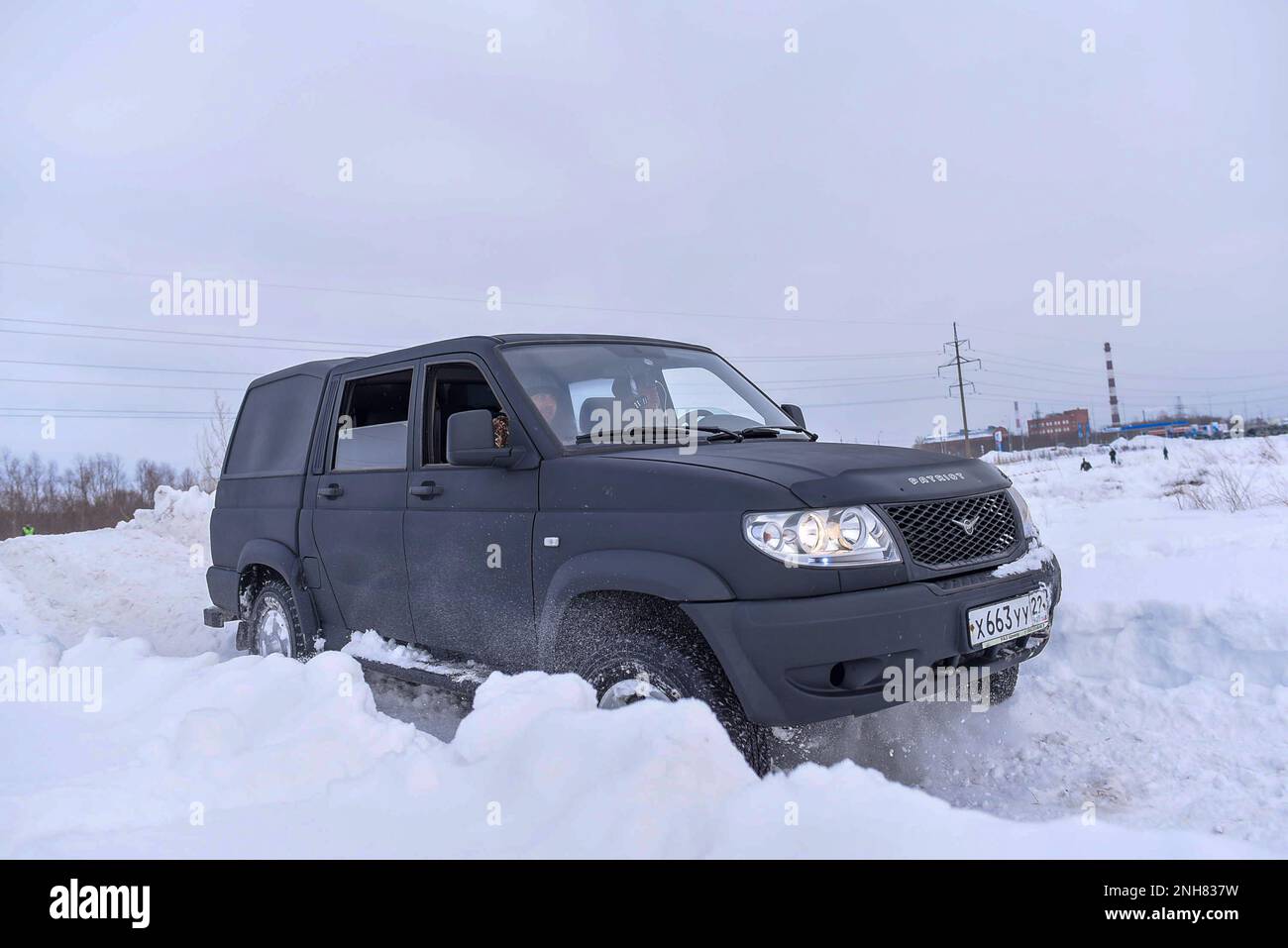 Russian black 4x4 SUV in protective paint "UAZ Patriot Pickup" is ...