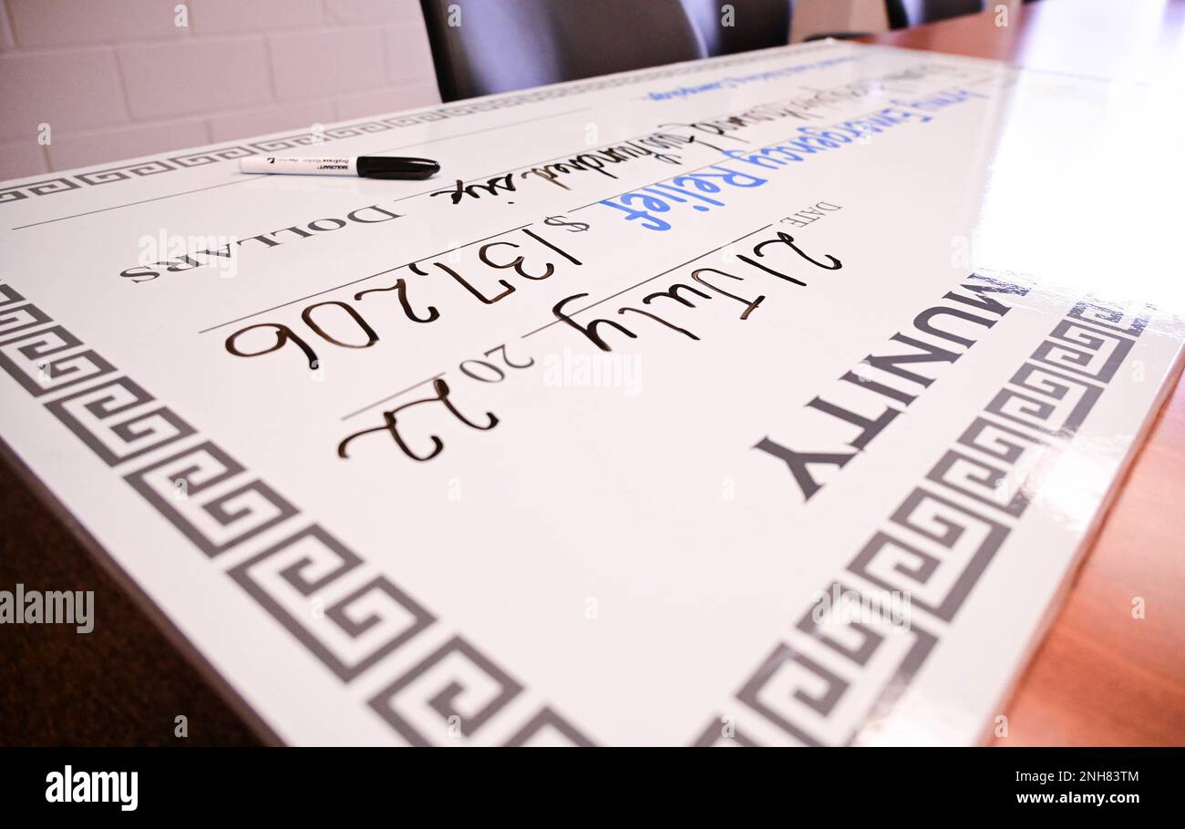 The Army Emergency Relief check is ready to be signed by Fort Jackson’s ...