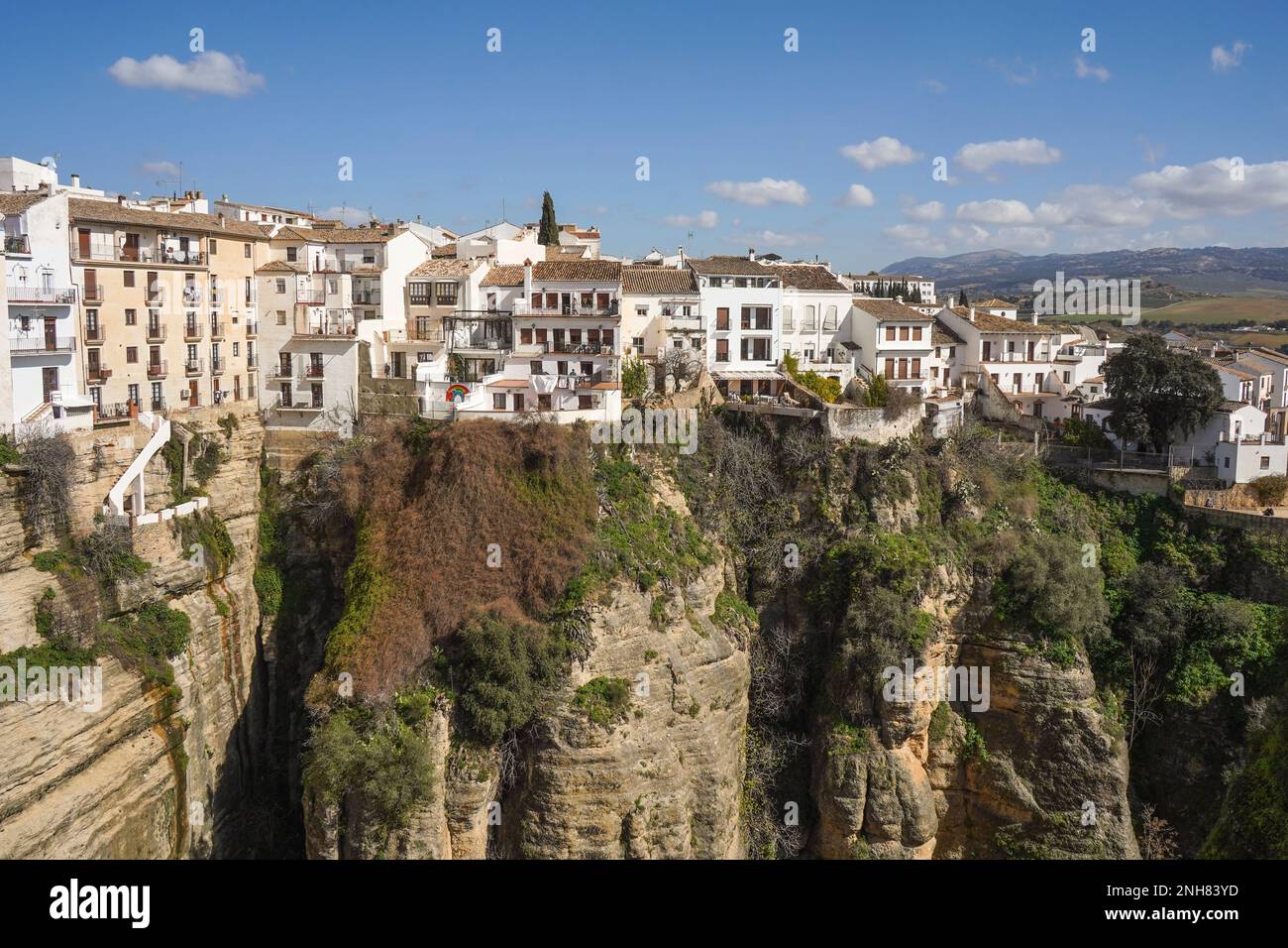 The deep Tajo gorge of Ronda, that splits the spanish village in two ...