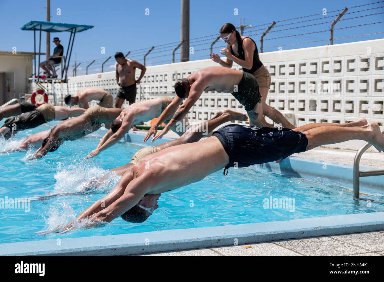 U.S. Marines participating in the Water Survival Advanced course dive ...