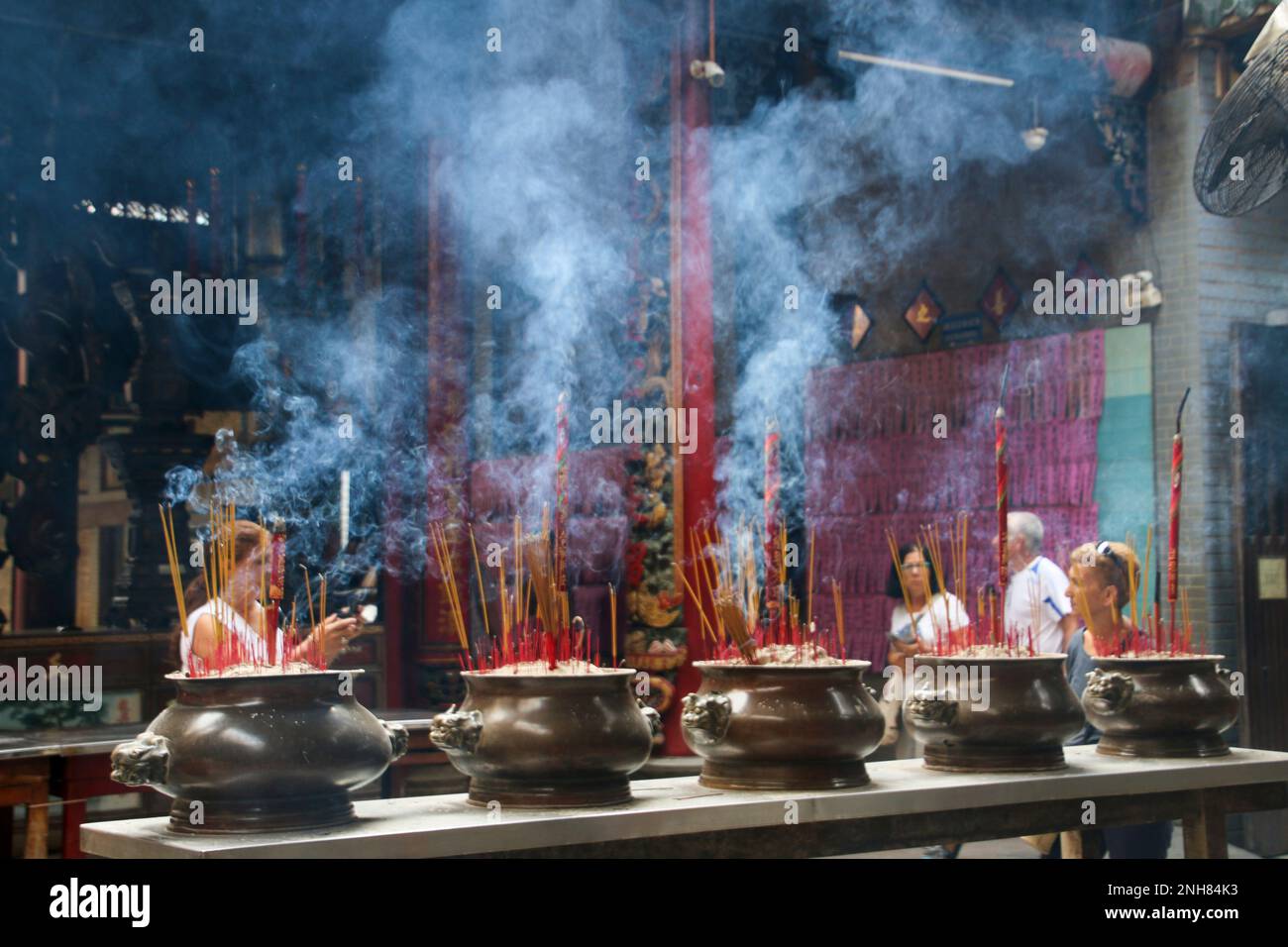 Lighting incense in the Interior of a temple Ninh Kieu, Can Tho ...