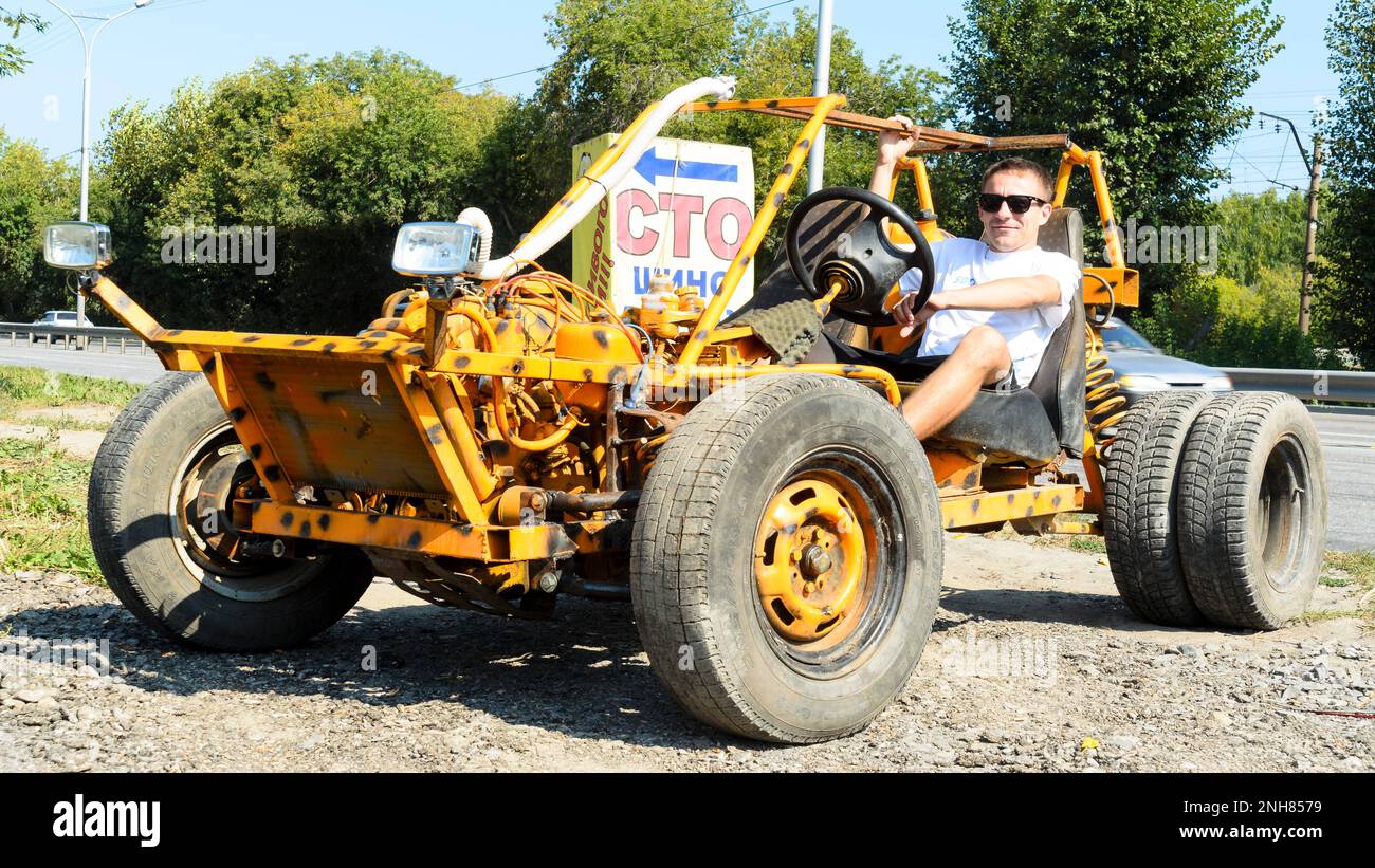 Driver sits on quad hi-res stock photography and images - Alamy