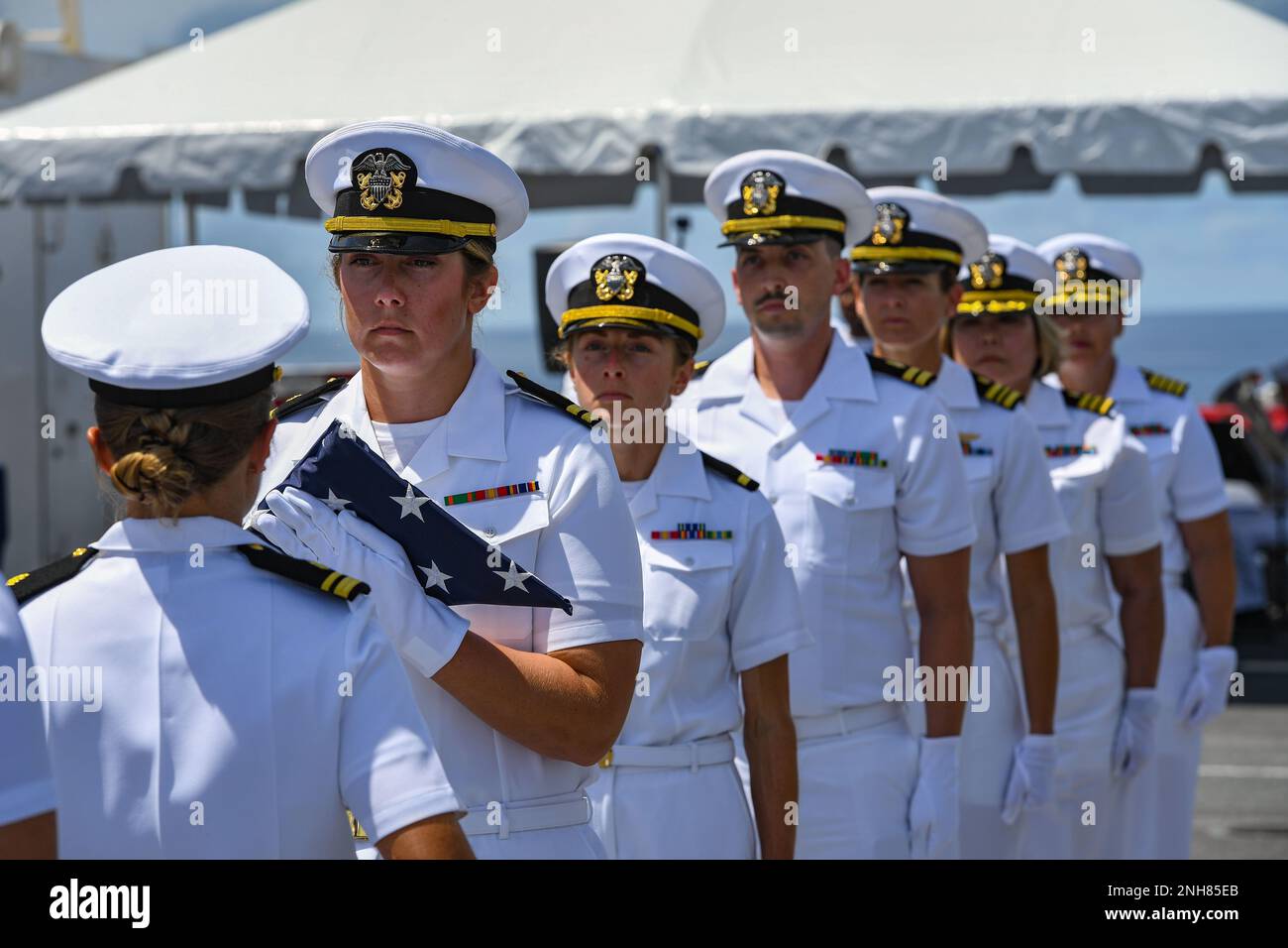 KOROR, Palau (July 21, 2022) – U.S. Navy Sailors pass the American flag ...