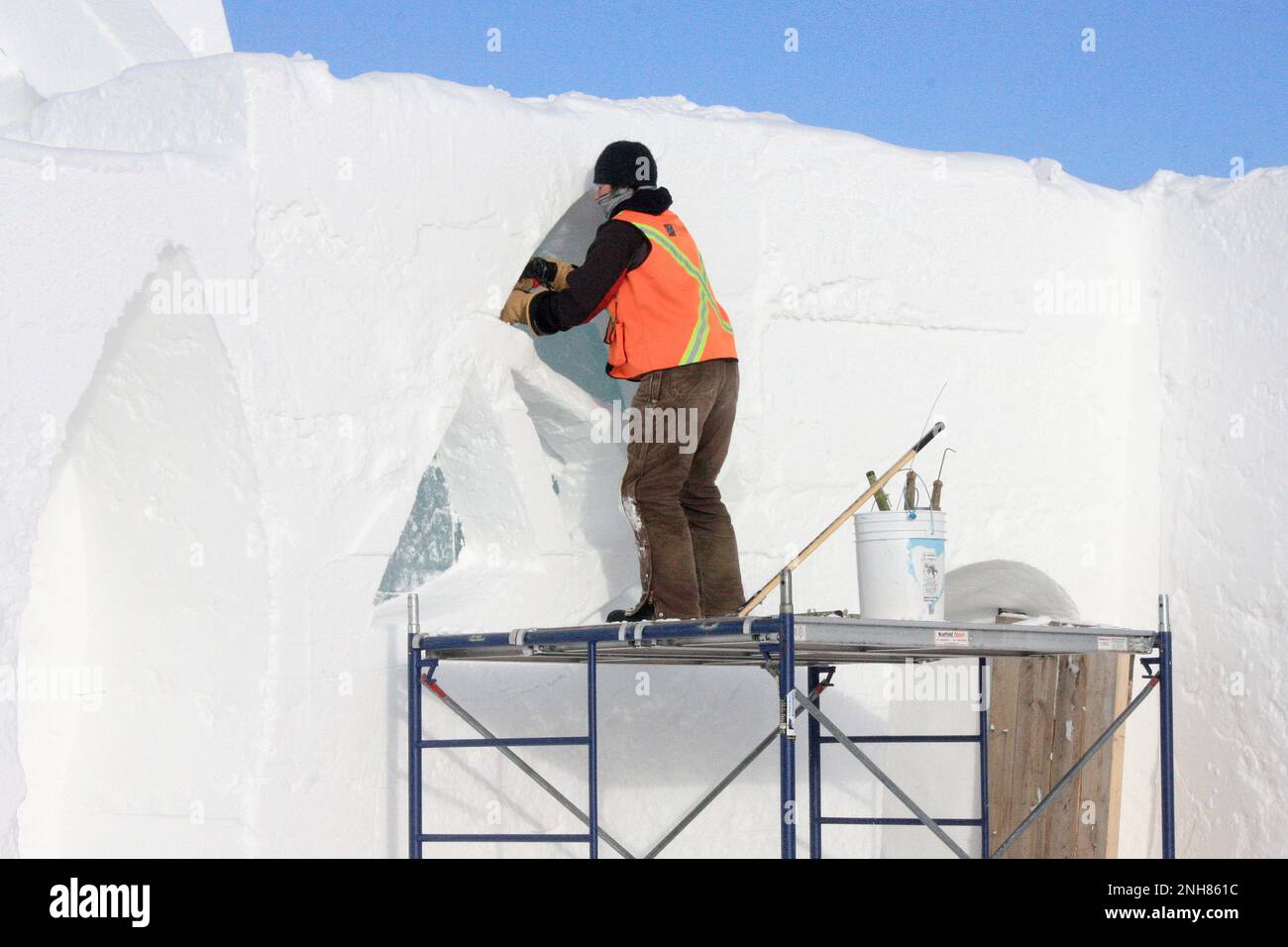 "Captain Morgan" Shauna Morgan carves out a window at the snow castle ...