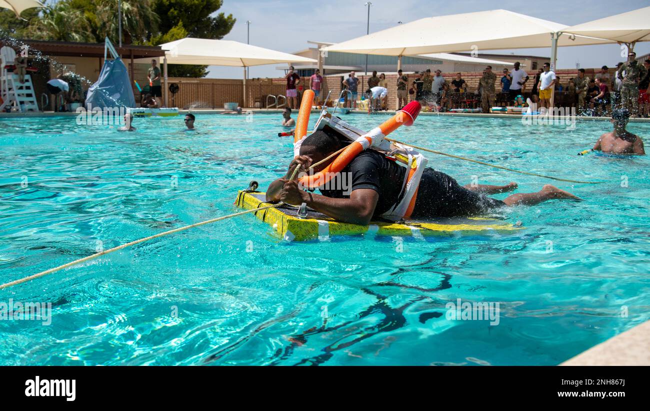 Members of the 56th Civil Engineer Squadron attempt to float across a ...