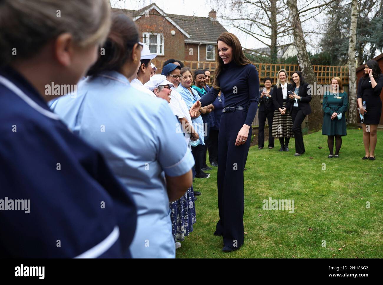 Britain's Kate, Princess of Wales meets staff during a visit to the ...