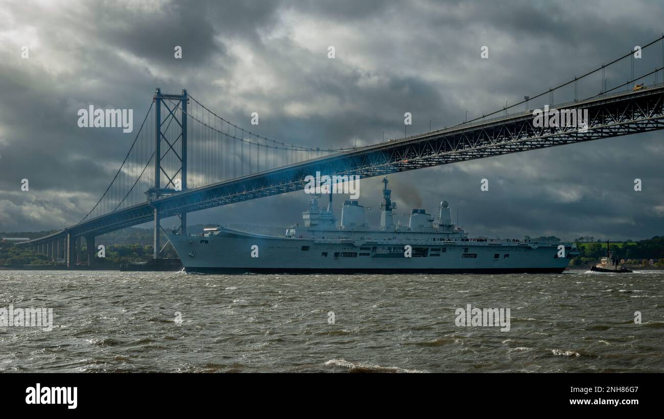 HMS Ark Royal sailing from Rosyth Dockyard and passing below the iconic ...