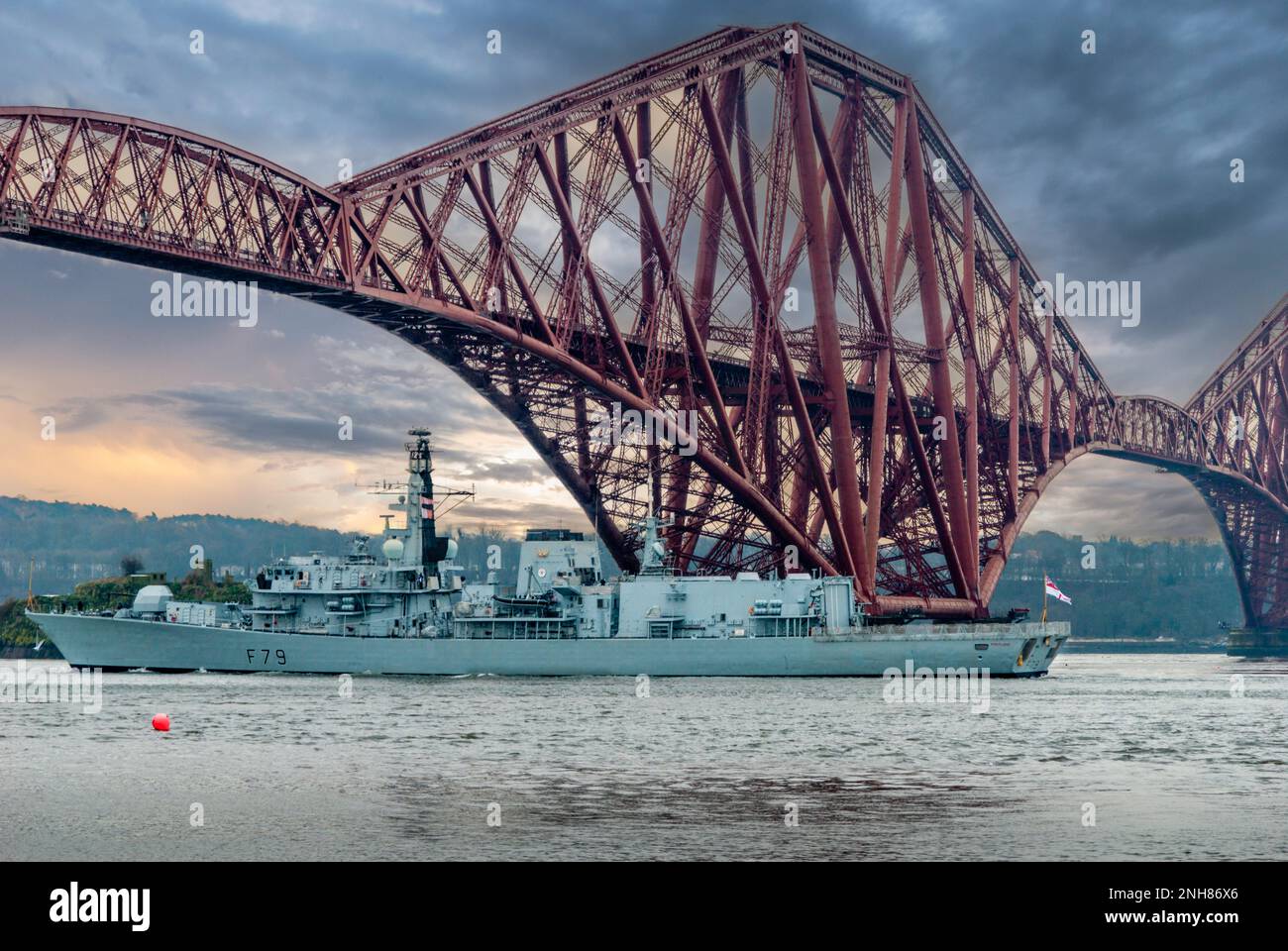HMS Portland leaving Rosyth dockyard and sailing below the iconic Forth ...