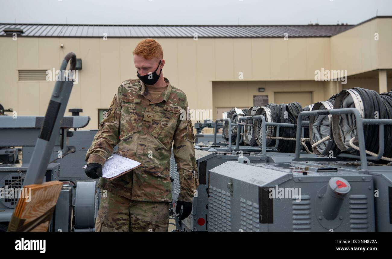Airmen from the 673rd Air Base Wing process cargo at the Joint Mobility ...