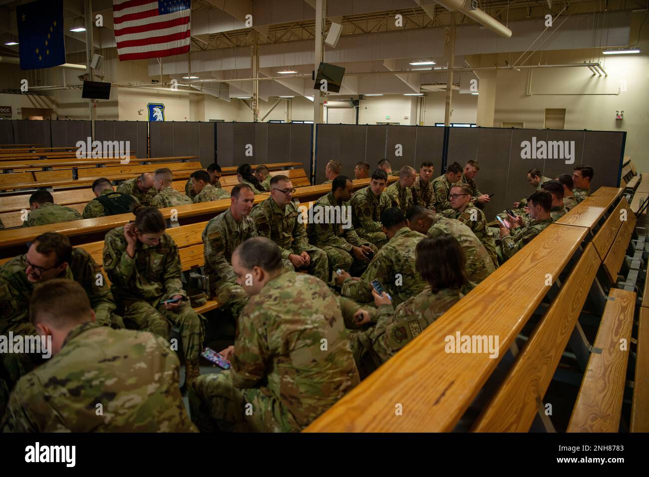 Airmen from the 3rd Wing proceed through the pre-deployment function ...