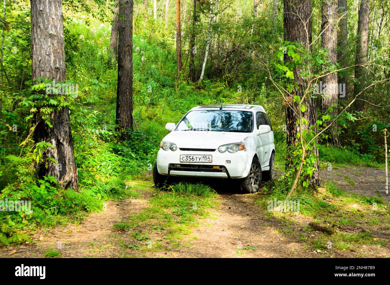 Car driving in mountain bend hi-res stock photography and images - Alamy