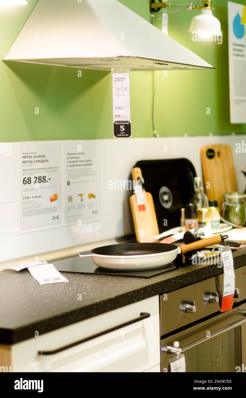 the interior of the store "IKEA". Kitchen tiles and extractor with ...