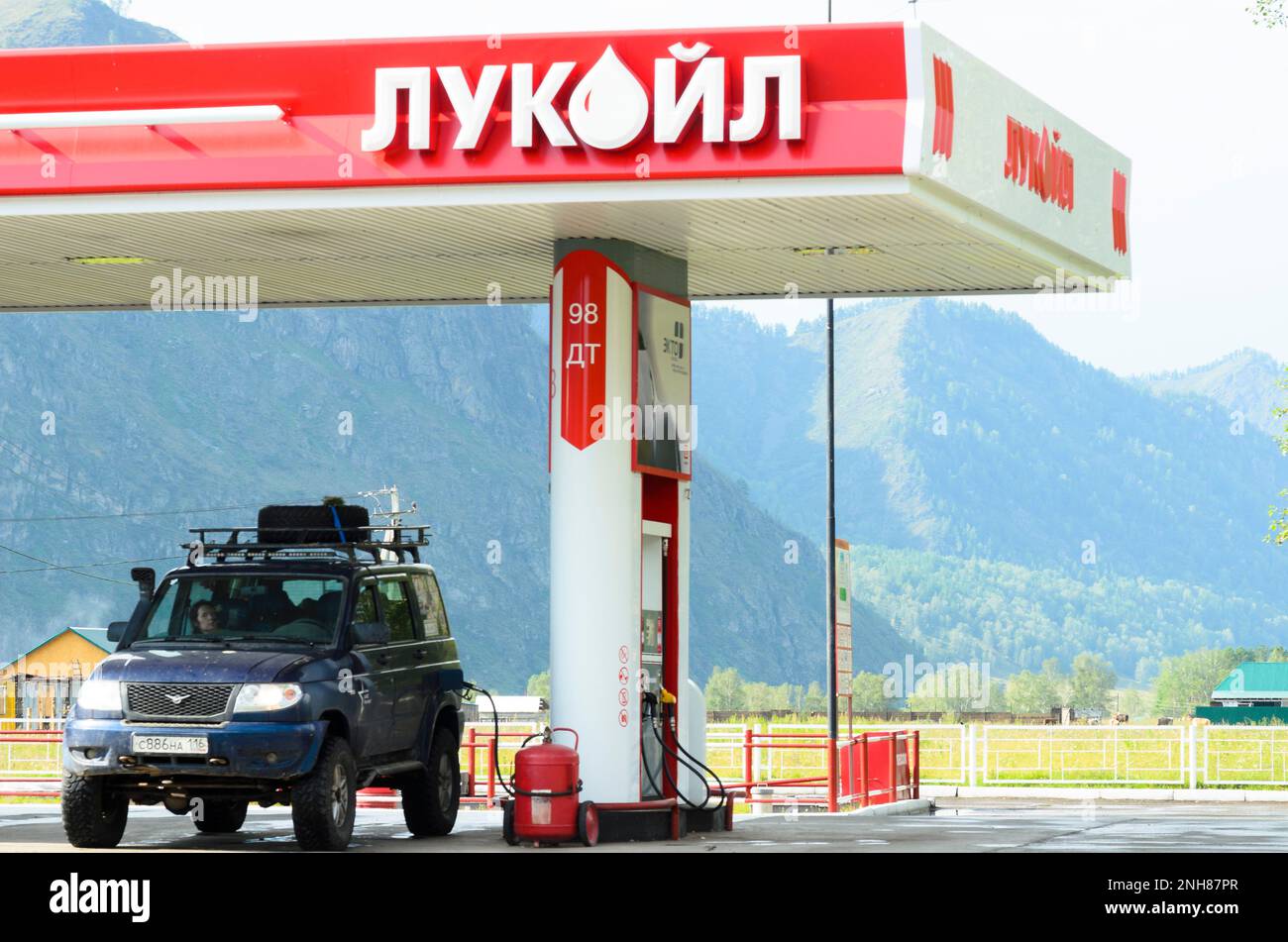 Forwarding Russian SUV "UAZ Patriot" is at the gas station "LUKOIL" in ...
