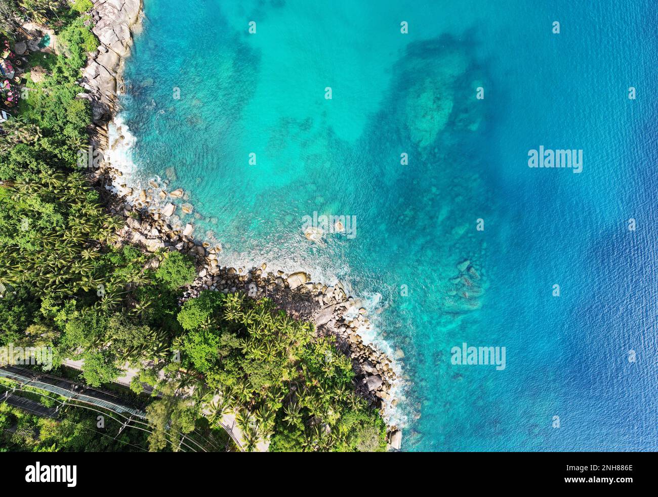 Aerial view of curve road along the seashore at Phuket Thailand ...