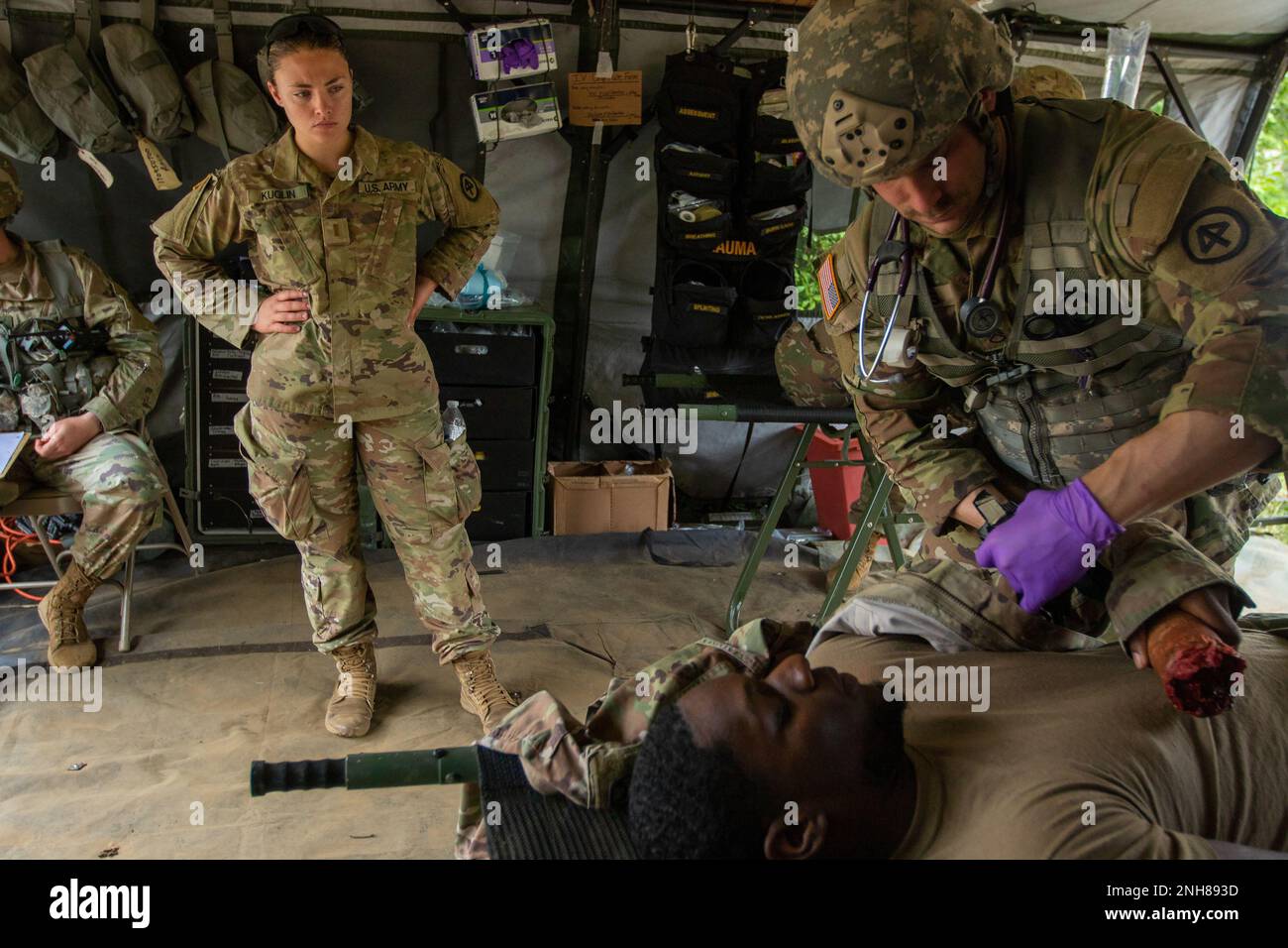 Staff Sgt. Jacob Lewis, right, medical treatment noncommissioned ...