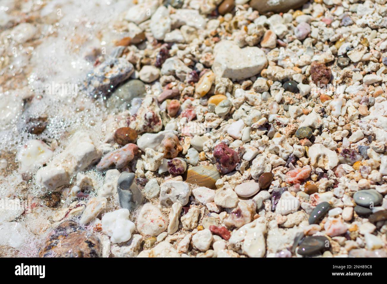Colorful pebbles on the shore at Kastanas beach, Milos Stock Photo - Alamy