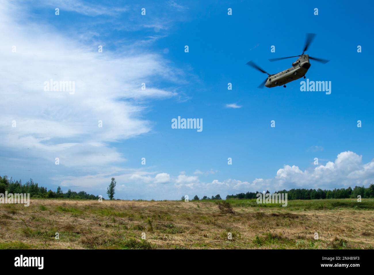 A New York Army National Guard CH-47 Chinook takes off with a simulated ...