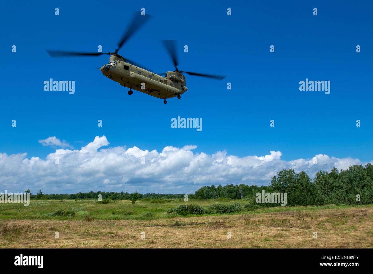 A New York Army National Guard CH-47 Chinook takes off with a simulated ...