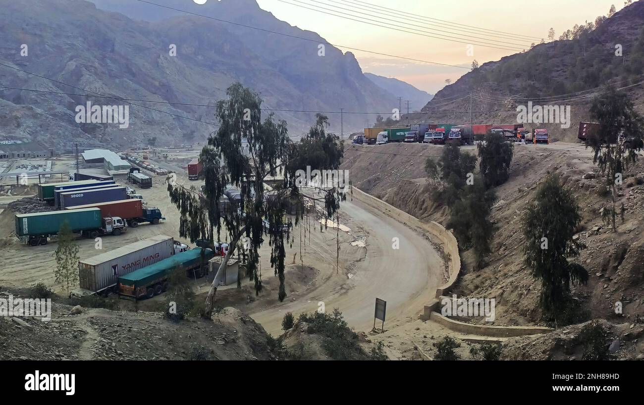 Stranded trucks loaded with supplies for Afghanistan, park in a ...