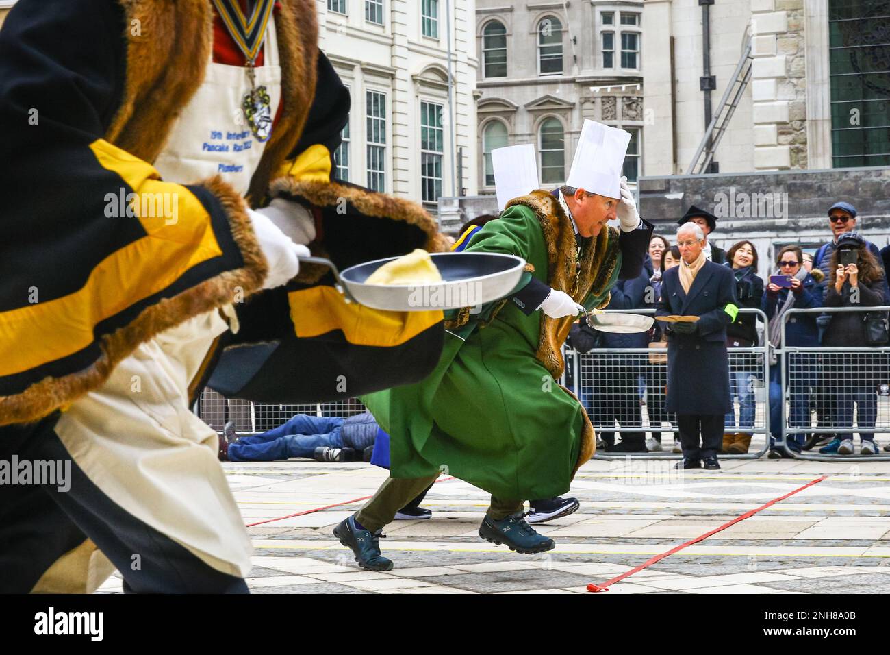 London, UK. 21st Feb, 2023. The liveries race against each other. The ...