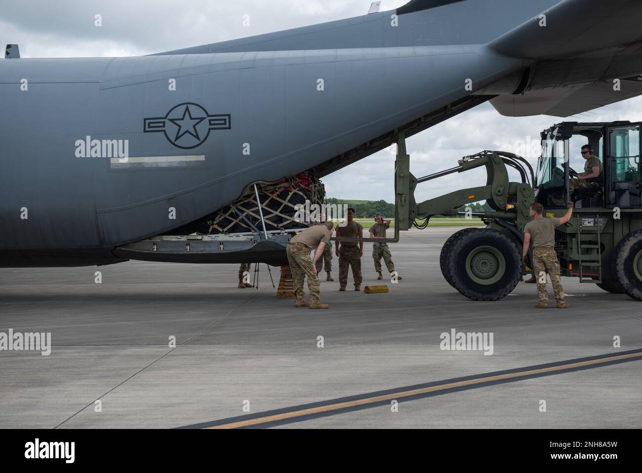 Pallets are loaded onto a C-130J Super Hercules aircraft at Savannah ...
