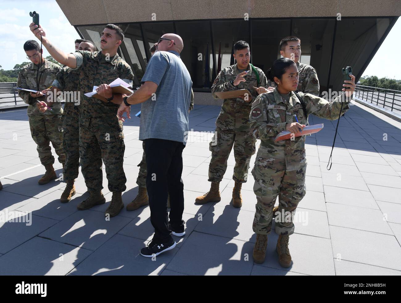 Jeffrey Light, 335th Training Squadron instructor, assists students ...