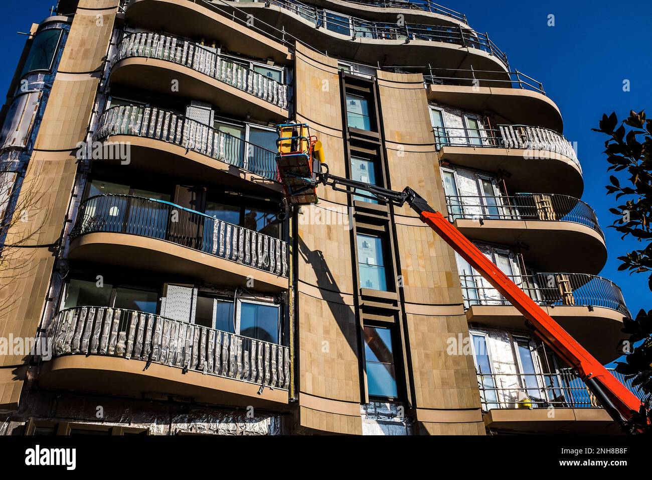 Maintenance work being carried out on an apartment block in Kensington ...