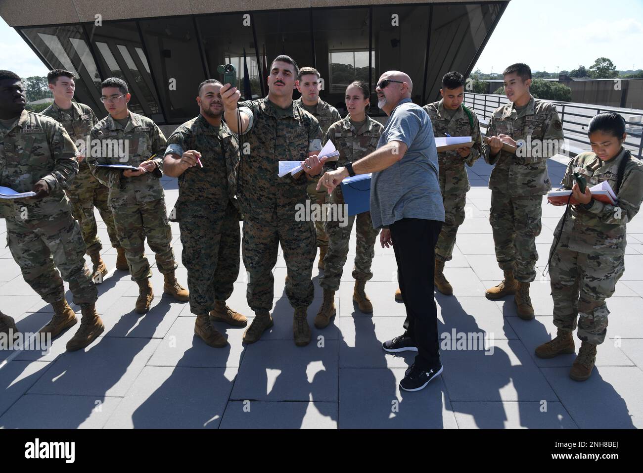 Jeffrey Light, 335th Training Squadron instructor, assists students ...