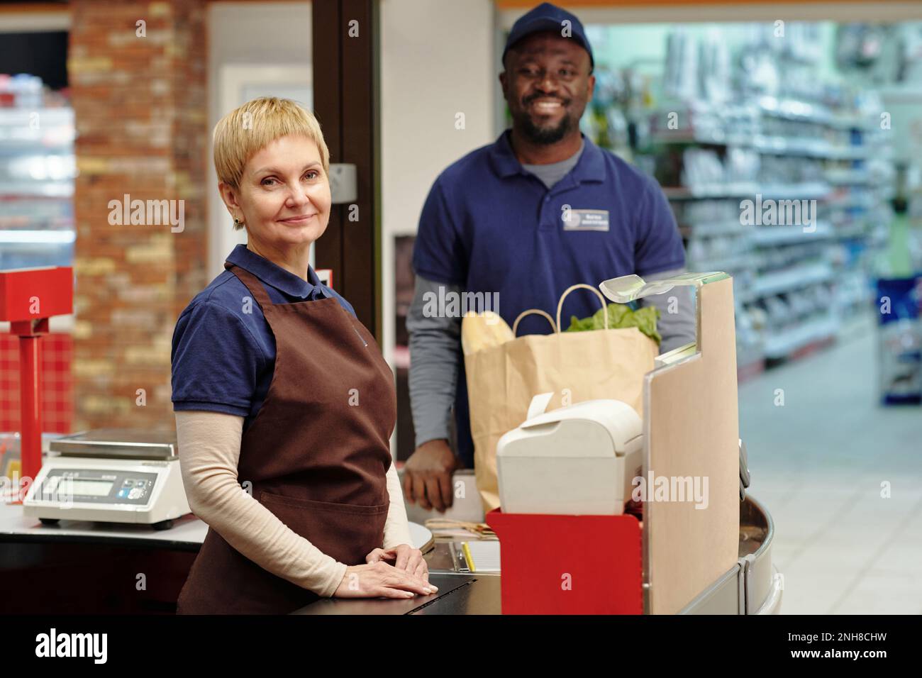 Happy team in supermarket store hi-res stock photography and images - Alamy