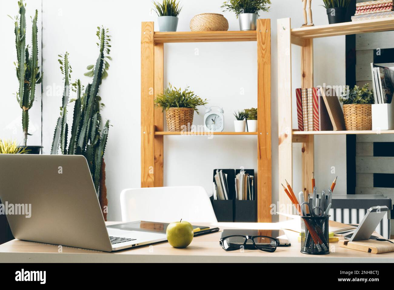 Stylish office table desk. Workspace with laptop Stock Photo - Alamy