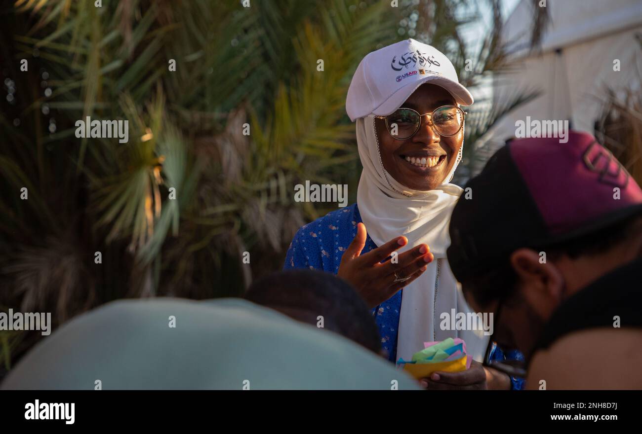 Youth volunteers welcome people to Our Nation’s Identity Photo Exhibit ...