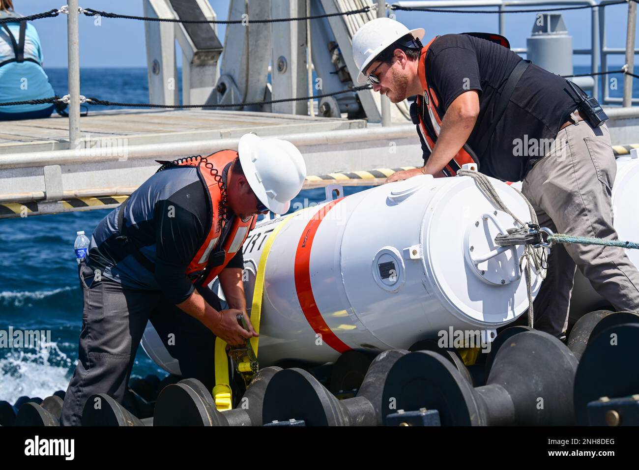 From left, Spencer Sharpe and Jarred Templeton, both deckhands assigned ...