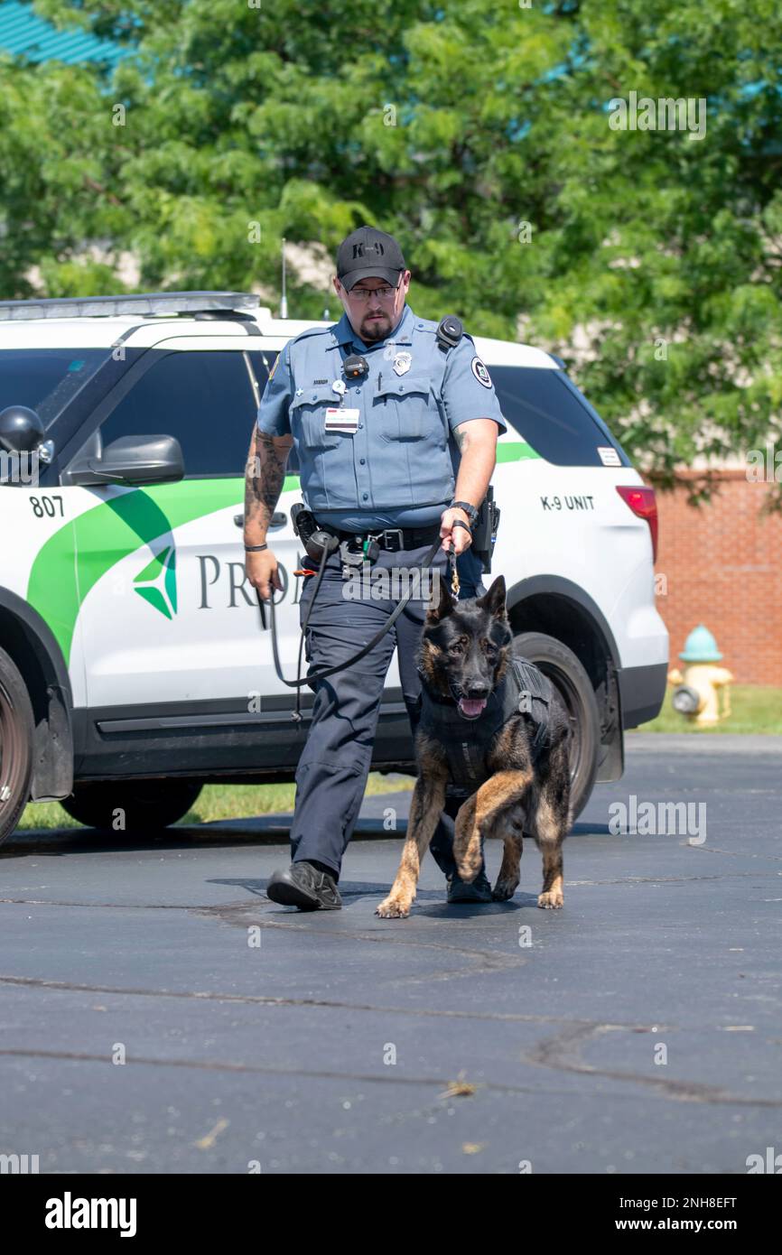Nicholas Buchan, a K-9 officer assigned to ProMedica Security, brings ...