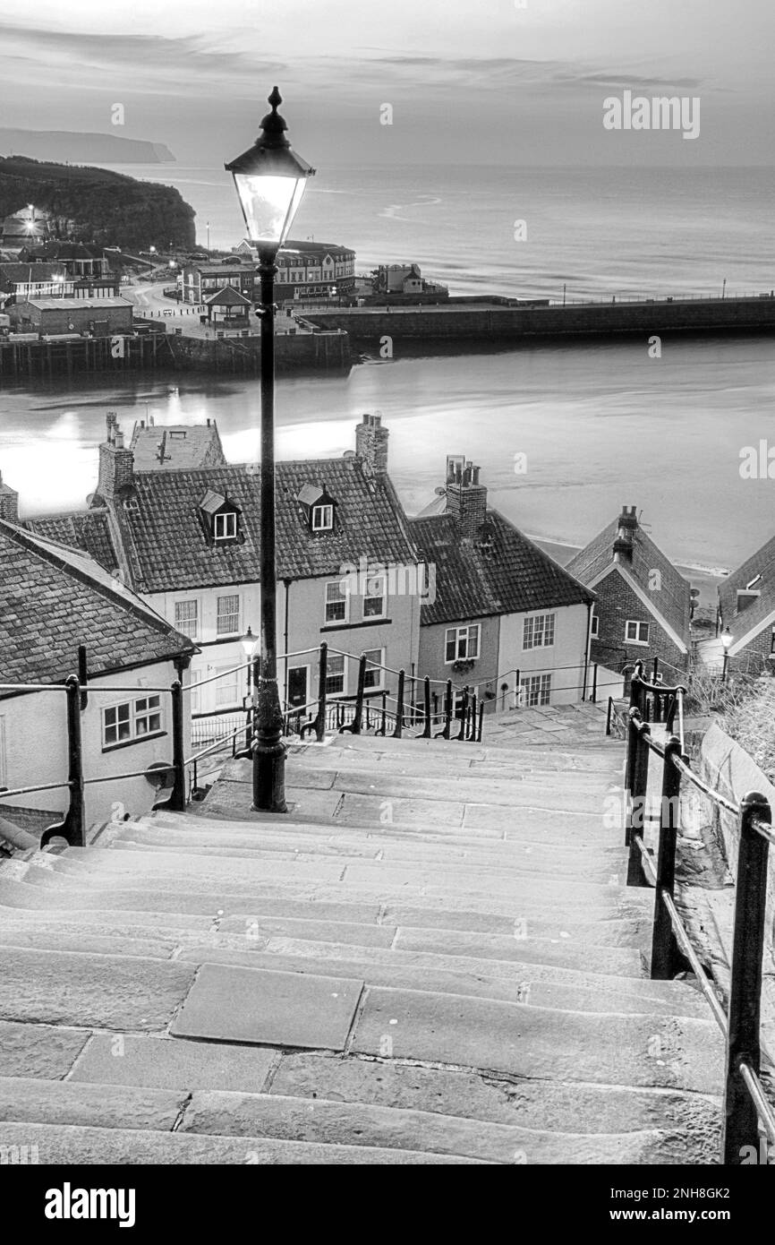 The Abbey steps at Whitby as the sun goes down Stock Photo - Alamy